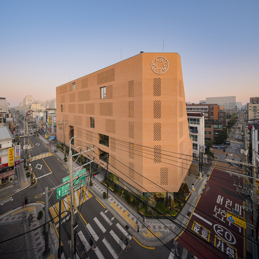 light-filtering brick facade wraps postpartum care center in seoul