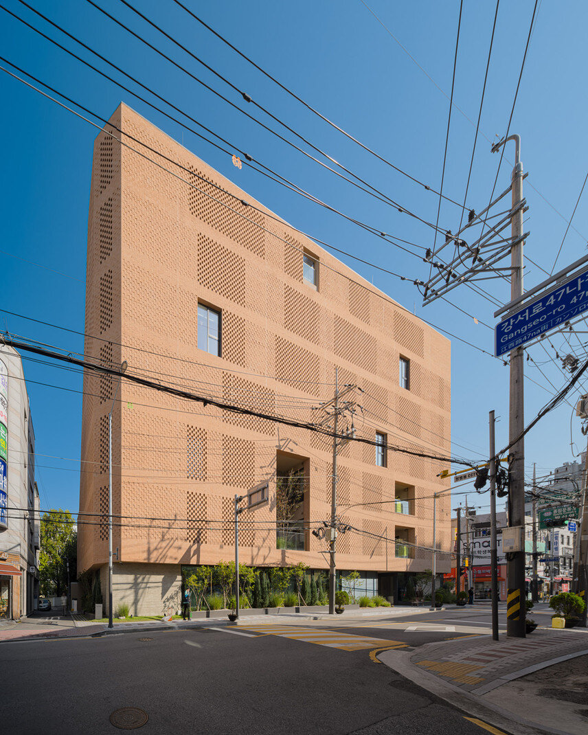 light-filtering brick facade wraps postpartum care center in seoul