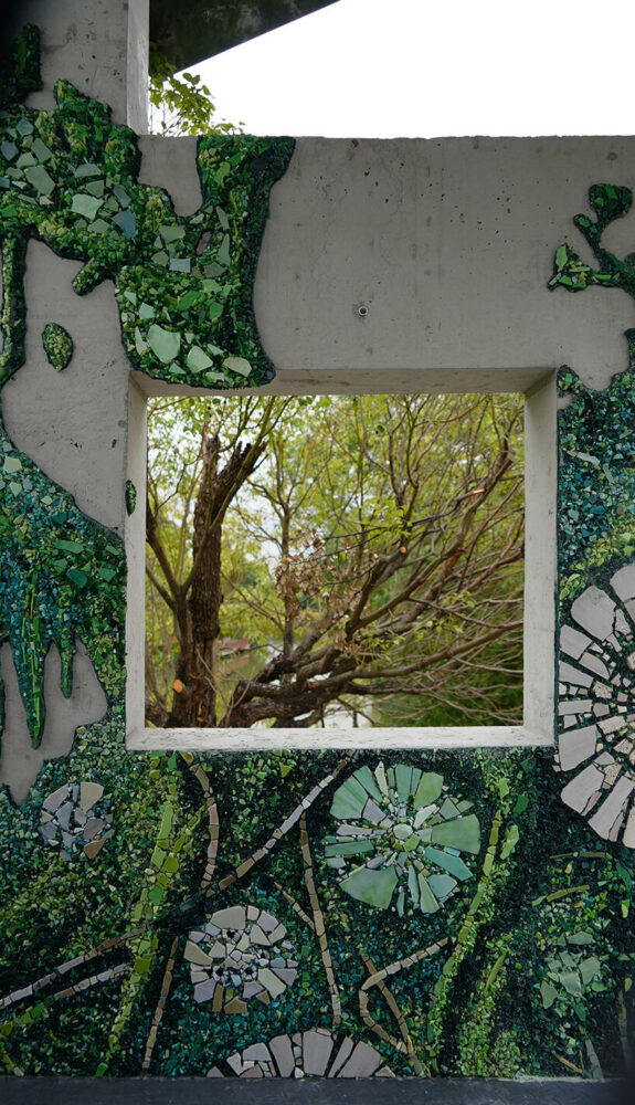 vertical tower by CLAB architects rises from concrete walls in china