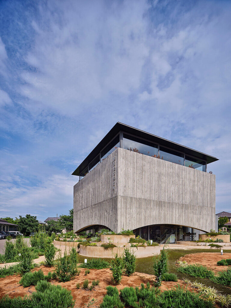 gin distillery in japan appears to float with arched openings by EA research and design office