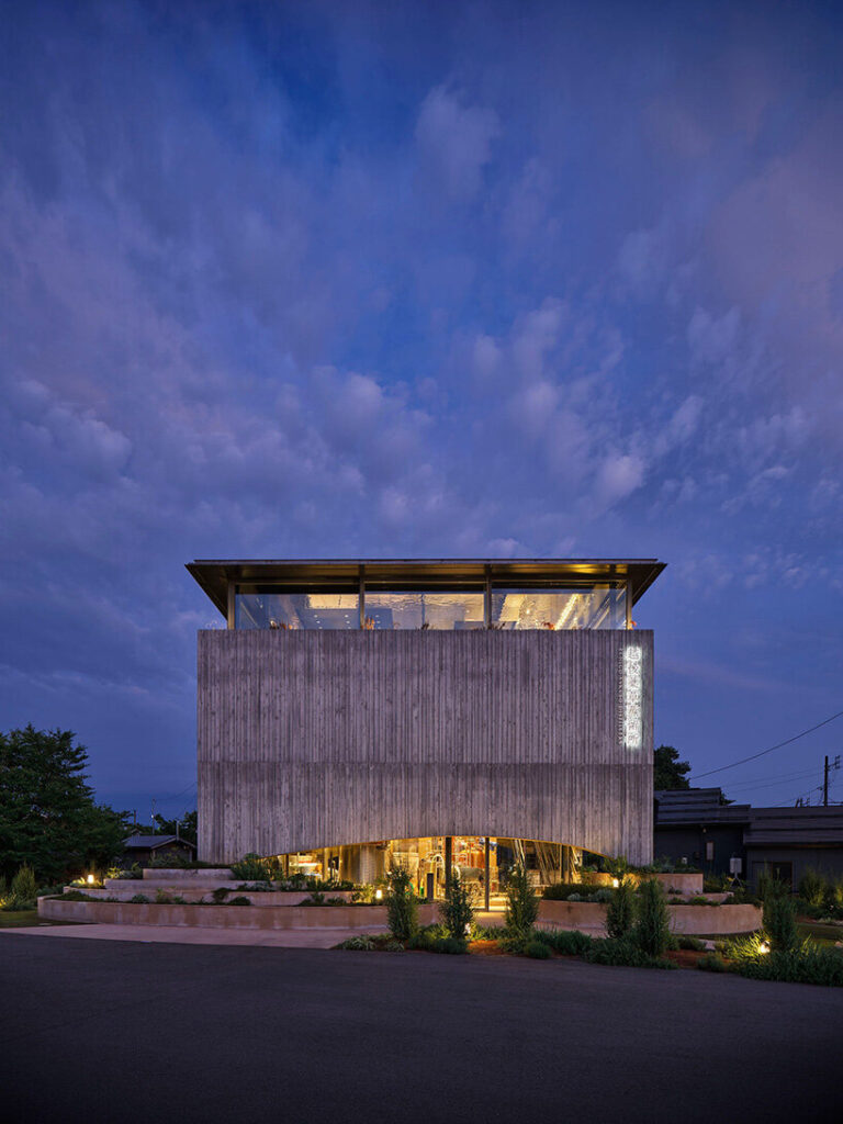gin distillery in japan appears to float with arched openings by EA research and design office