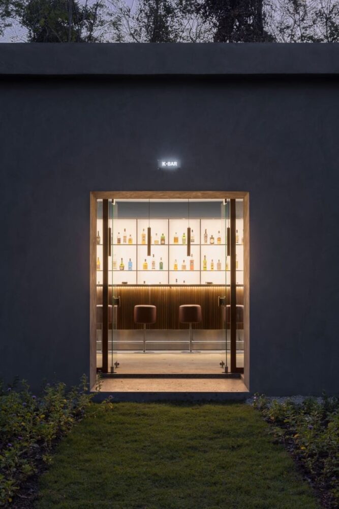 elmgreen & dragset's six-seat bar pavilion appears like a mirage in ...