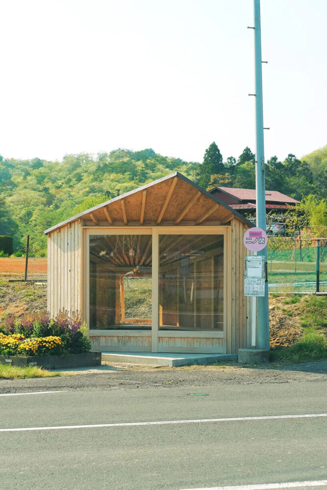 fan-shaped bus stop by ginga architects welcomes schoolchildren in ...