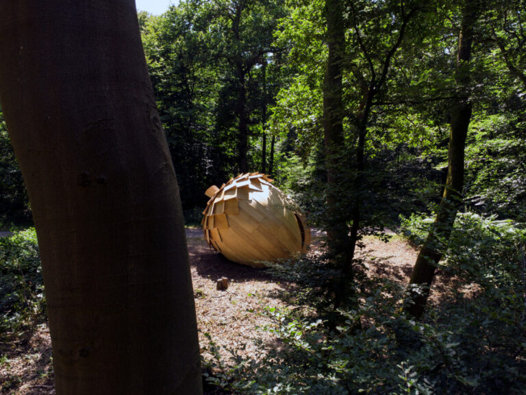 LFZ studio's giant wooden acorn is a meditative pod in france forest