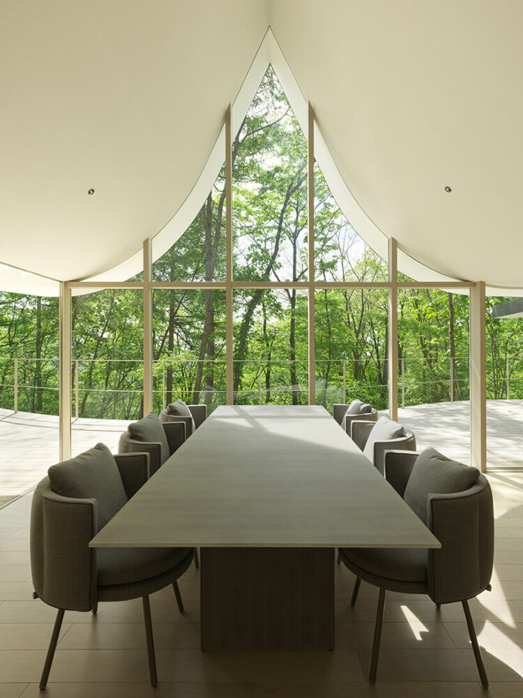 nendo weaves six cottages together with 'hand-holding' roofs in ...