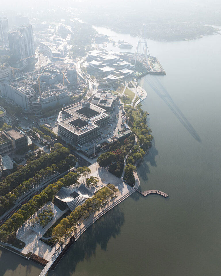 BIG unveils jinji lake pavilion with pixelated glass roof on suzhou's waterfront