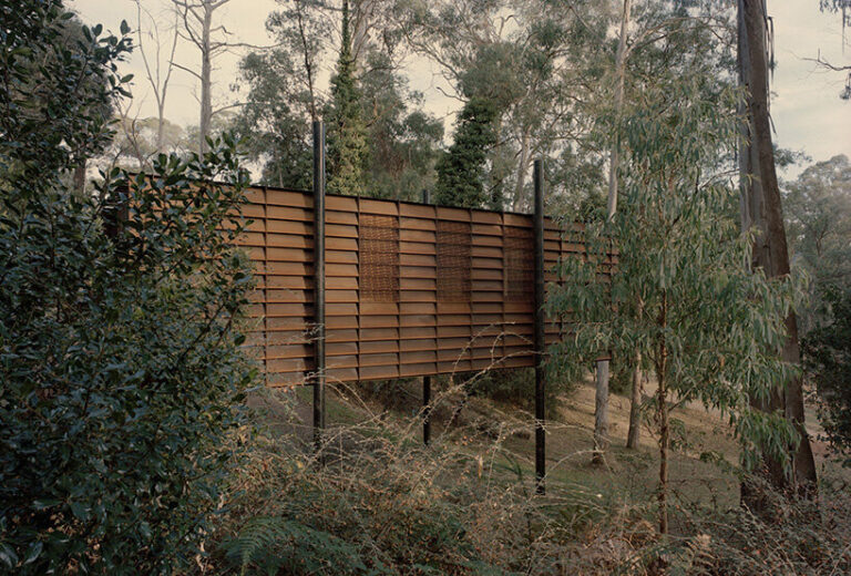 steel slats filter sunlight into robbie walker's sawmill treehouse