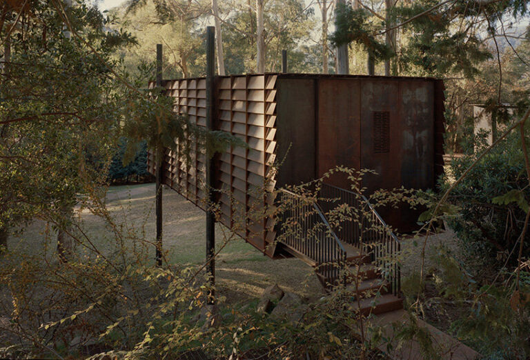 steel slats filter sunlight into robbie walker's sawmill treehouse