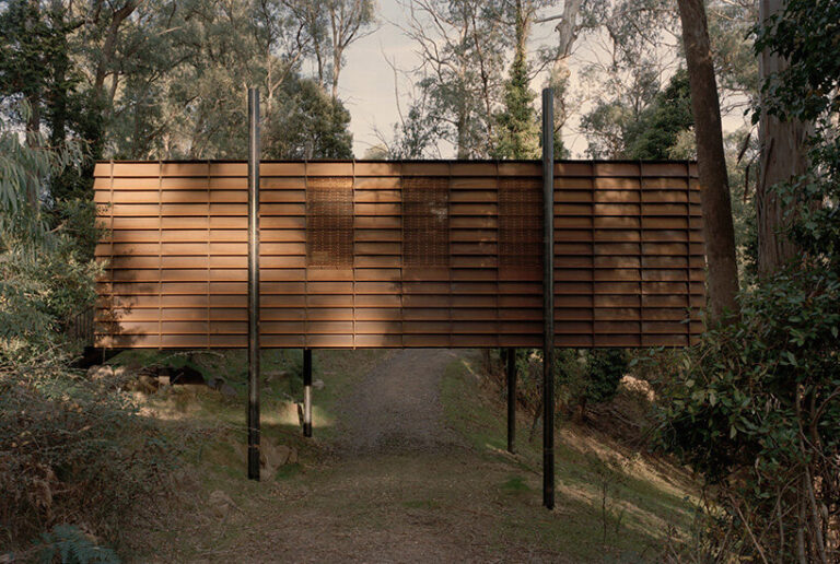 steel slats filter sunlight into robbie walker's sawmill treehouse