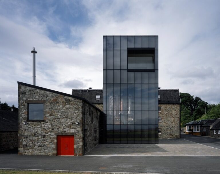 transparent lighthouse by barthélémy griño extends whisky distillery in ...