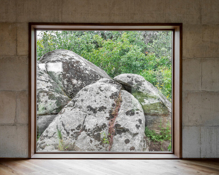 durable castilian fortresses inspire this 'house X' by bojaus arquitectura