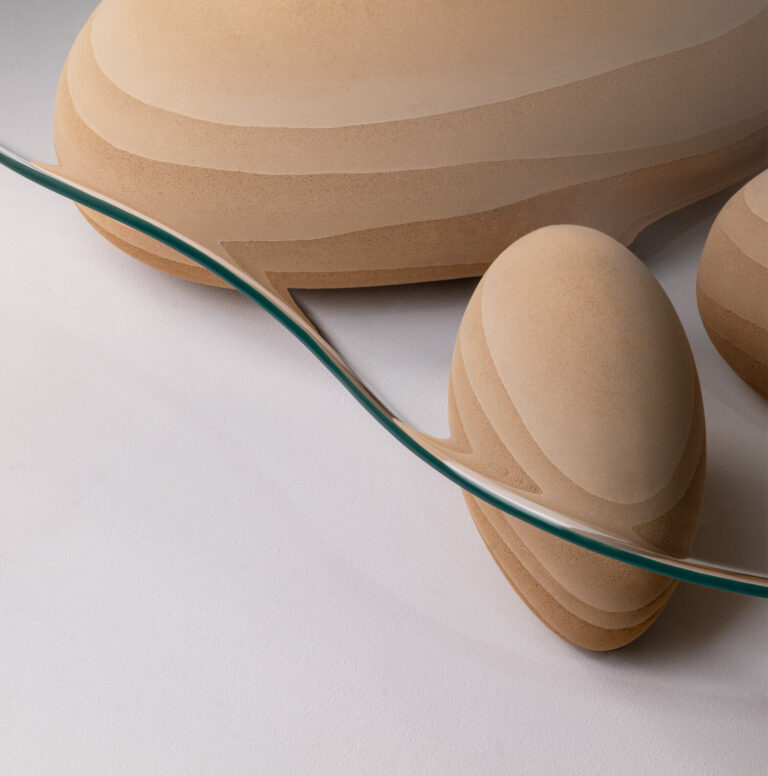 karim+elias' desert drop table evokes image of droplets in sand