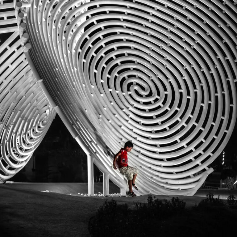 sculptural steel installation shapes touching fingerprint ridges