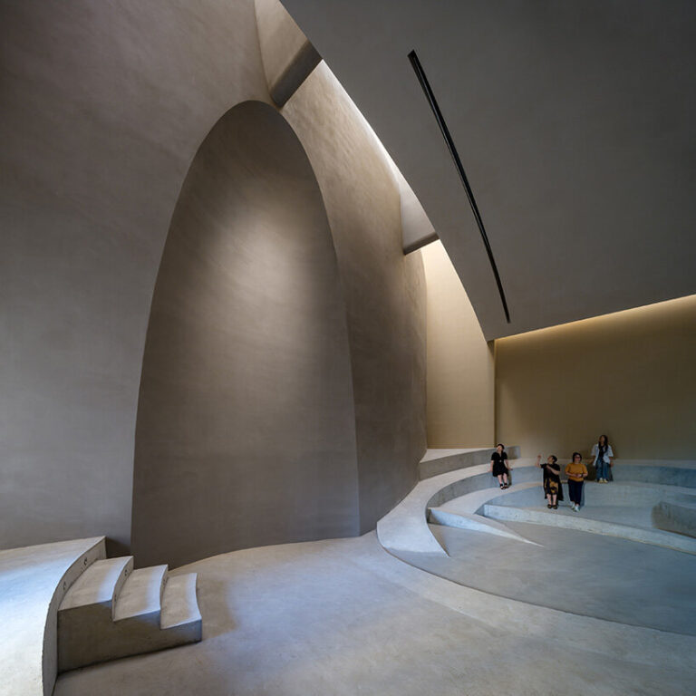 spActrum sculpts multi-centered concrete interior as continuous ...