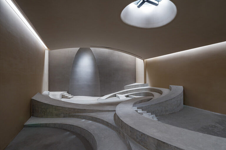 spActrum sculpts multi-centered concrete interior as continuous ...
