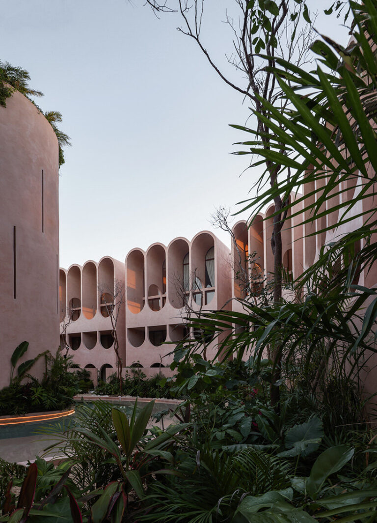 central tower rises from elliptical courtyard in V taller's arched ...