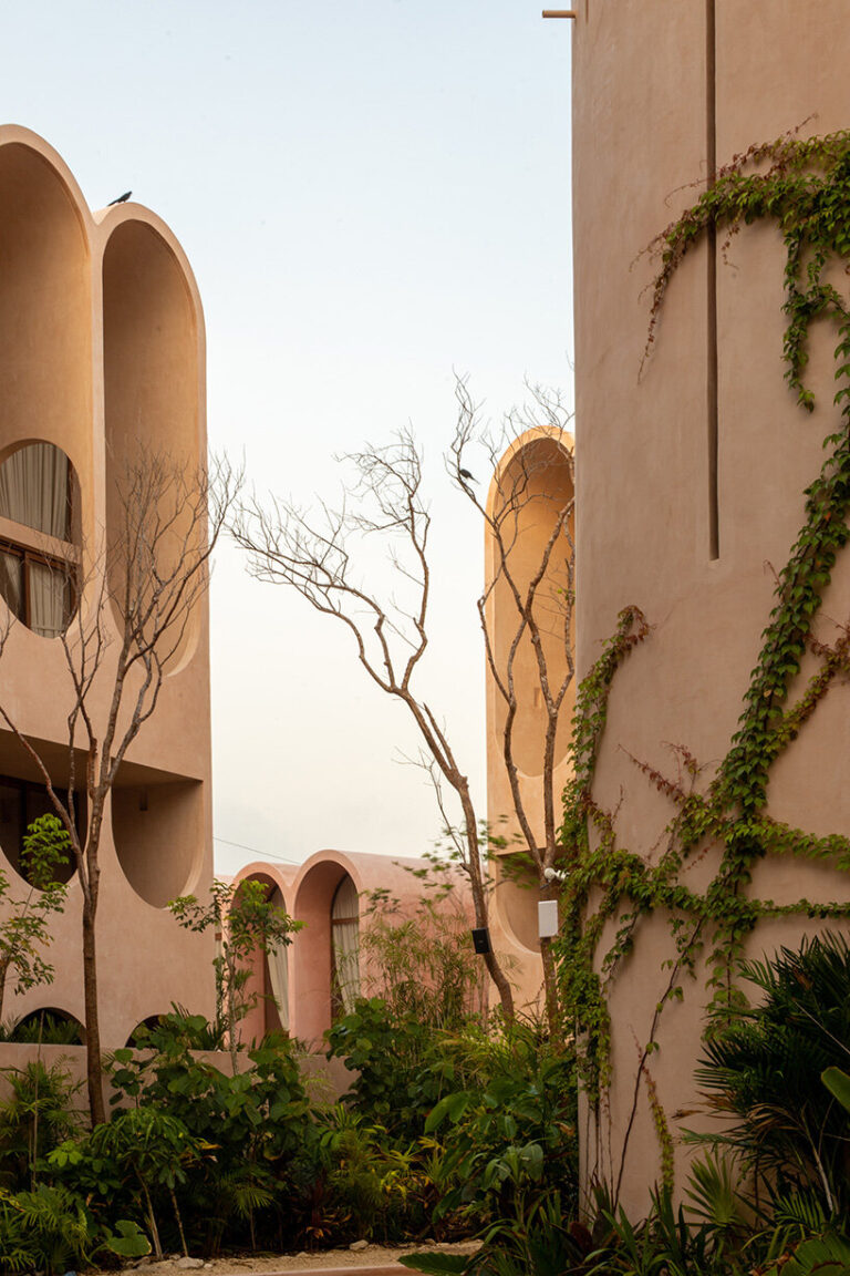 central tower rises from elliptical courtyard in V taller's arched ...