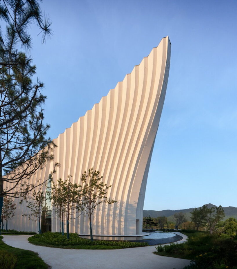 curved concrete roofs root atelier alter architects' museum into ...