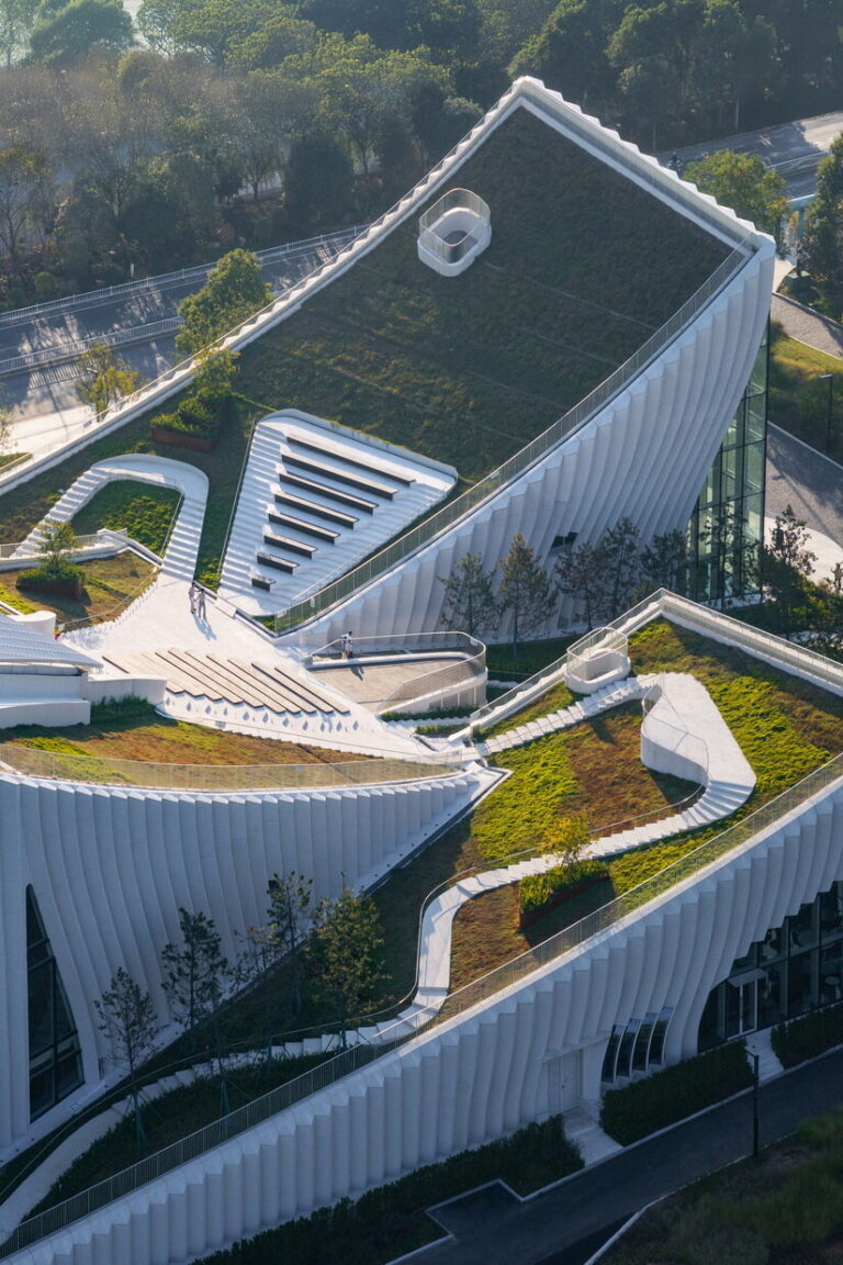 curved concrete roofs root atelier alter architects' museum into ...