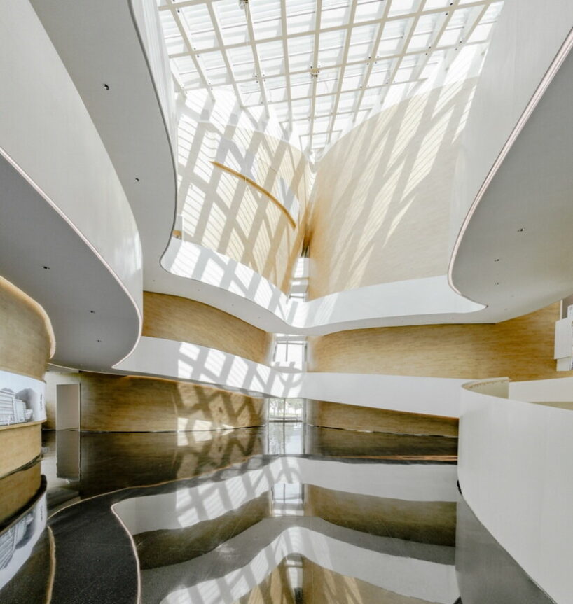 curved concrete roofs root atelier alter architects' museum into ...