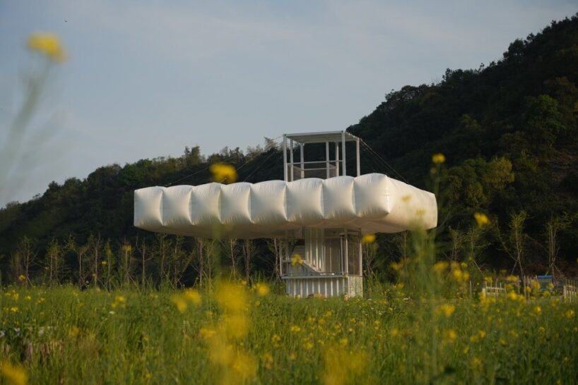 trio of inflated pavilions sit amid rice fields in china