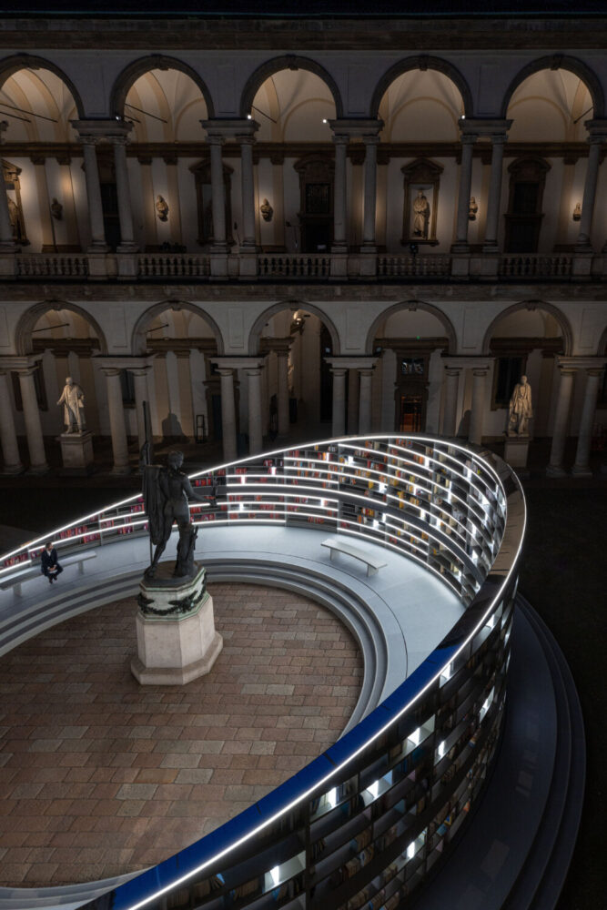 es devlin's rotating library installation illuminates milan design week