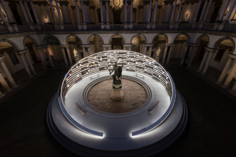 es devlin's rotating library installation illuminates milan design week