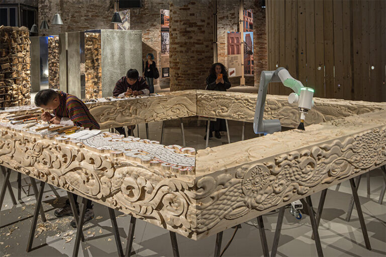 BIG's 'ancient future' fuses hand-carving and robotics at venice biennale 2025