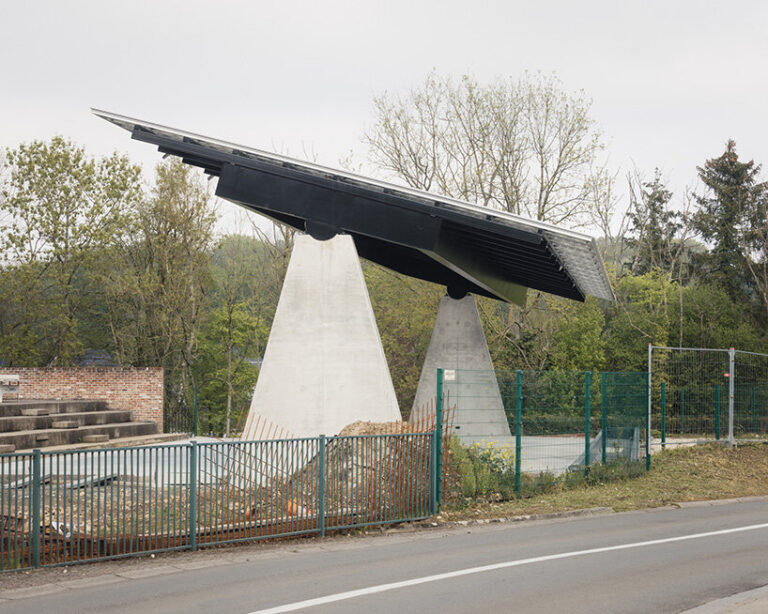 label tops sports center walkway with translucent dome in belgium