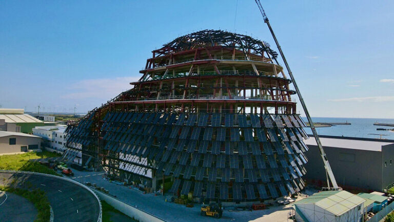 solar panel skin takes shape as MVRDV's sun rock tops out in taiwan