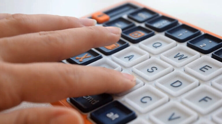 oncue is modular keyboard and wearable cuffs for users with parkinson's