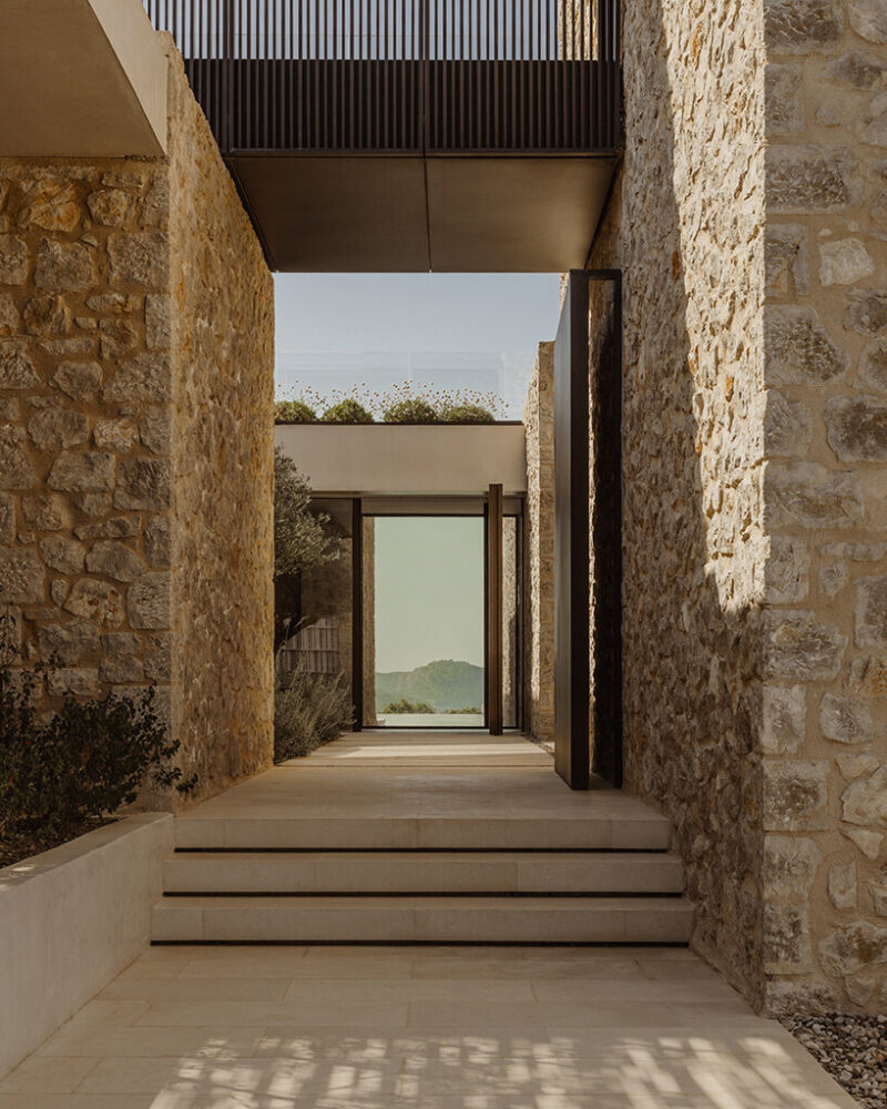 k-studio's southwand house follows sloped olive groves of messinia