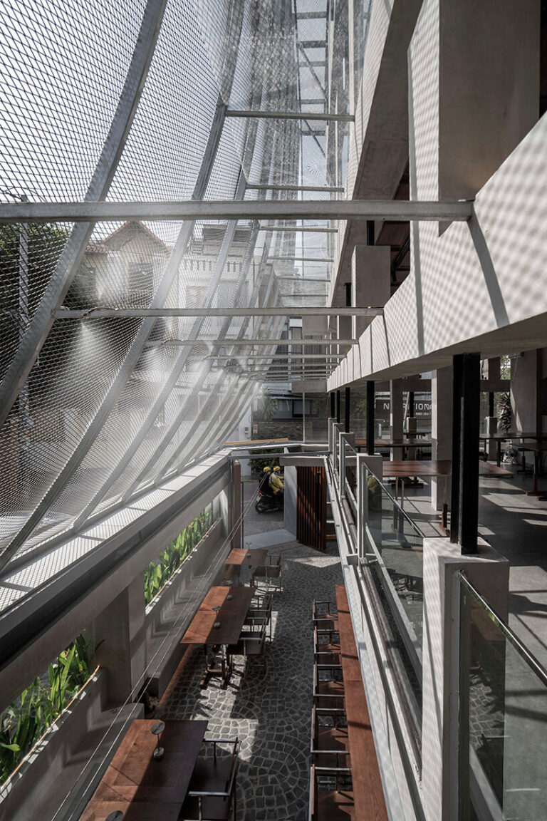 metal veil by KHOA VU turns vietnamese villa into a restaurant