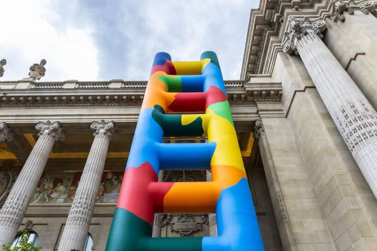 paola pivi installs 20-meter ladder outside the grand palais in paris
