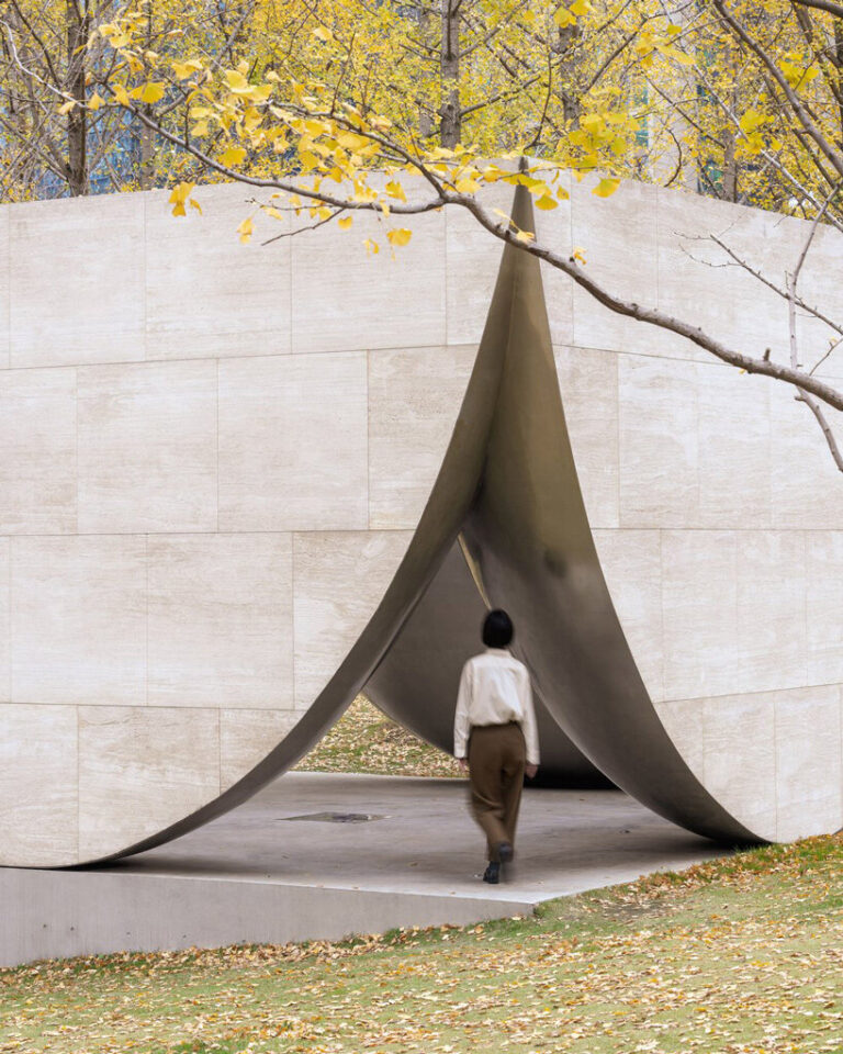 atelier xi unveils public art center as a landscape of four travertine ...