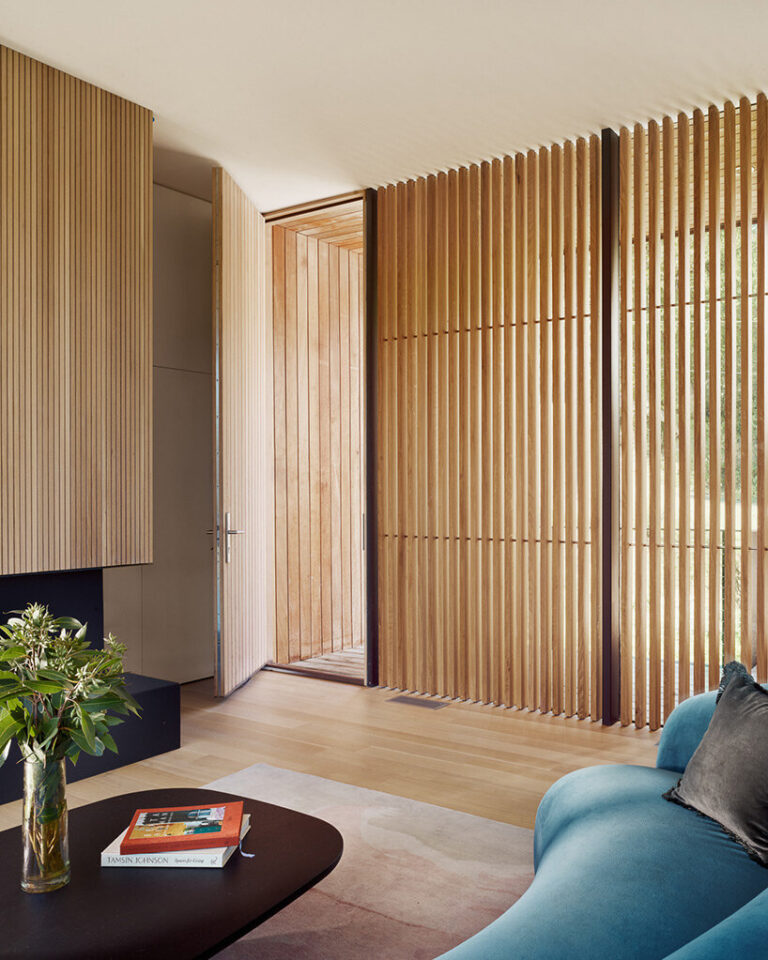 alterstudio's falcon ledge residence climbs steep ravine in austin