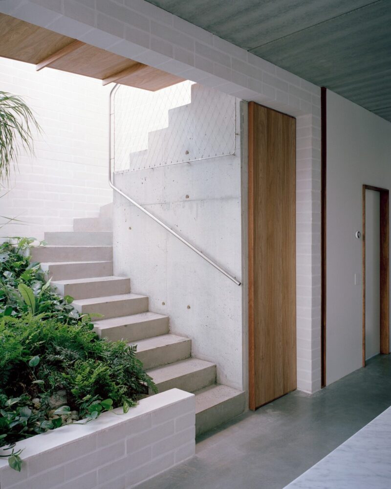 terracotta, bricks, and metal wrap peter besley's australian house