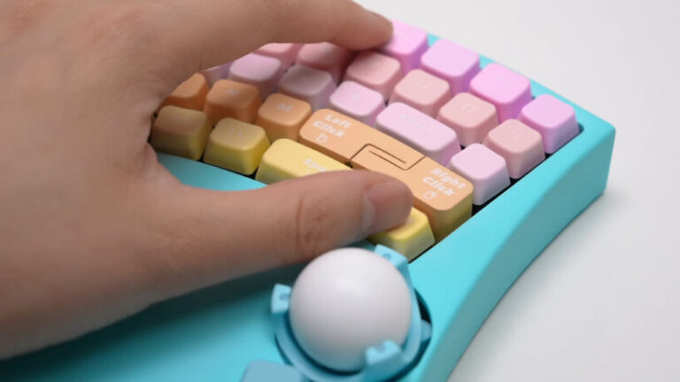 fan-shaped keyboard with mouse lets users type with one hand