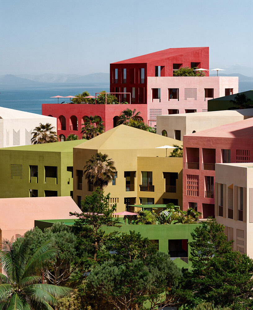 oppenheim architecture layers vibrant towers on albania's coast