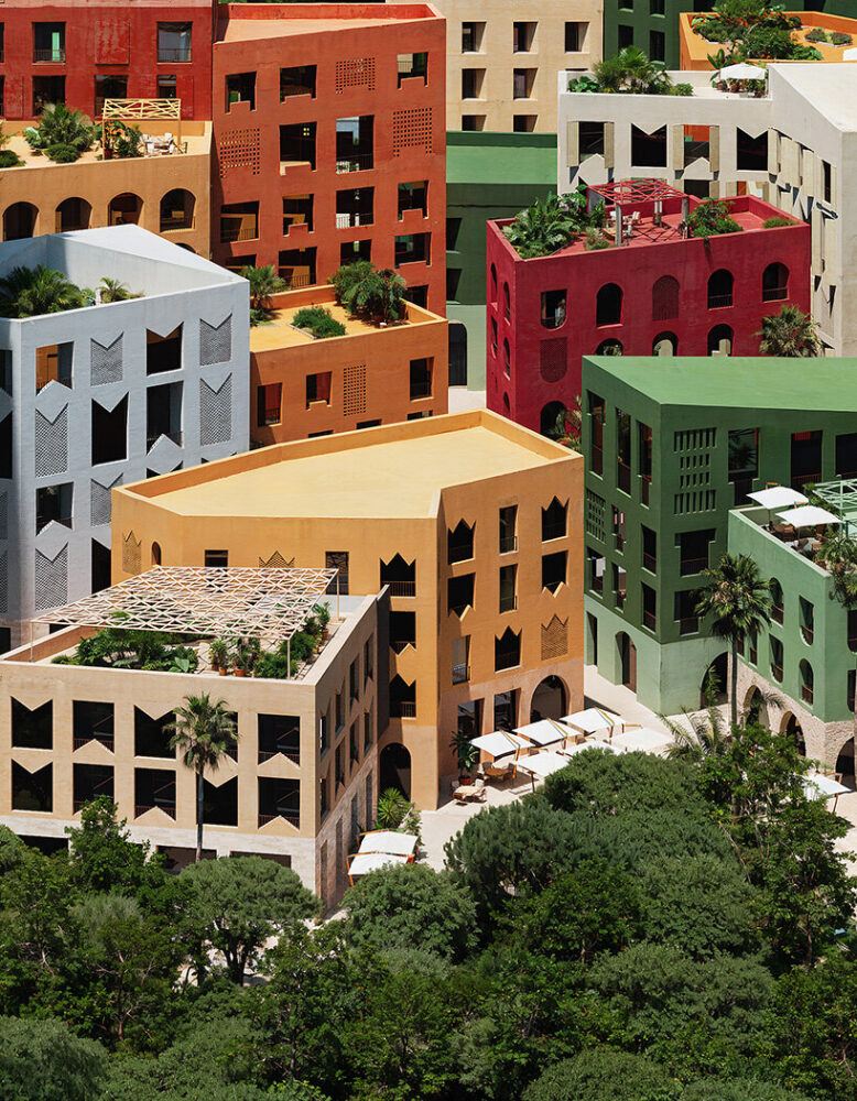 oppenheim architecture layers vibrant towers on albania's coast