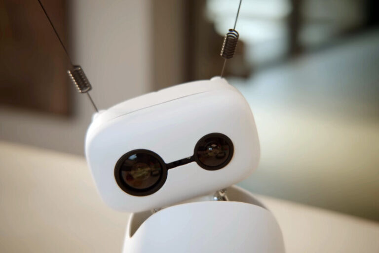 programmable desktop robot reachy mini knows and talks to people