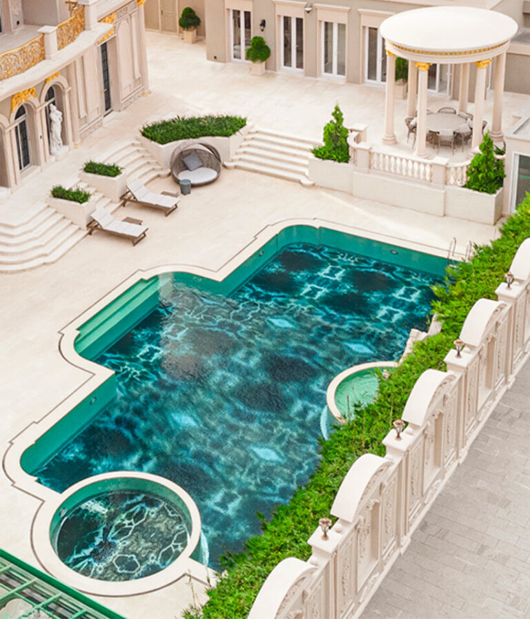 SICIS creates glowing pool with decorative glass for cambodian villa