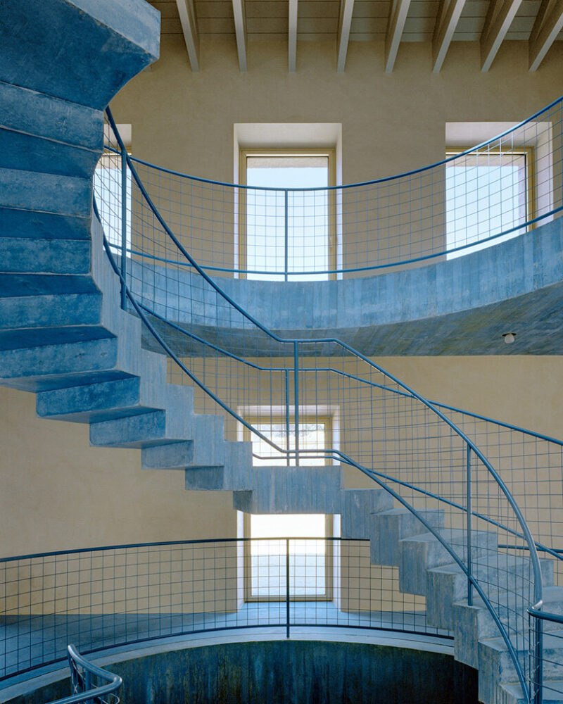 arquitectura-G embeds blue concrete core in portuguese residence