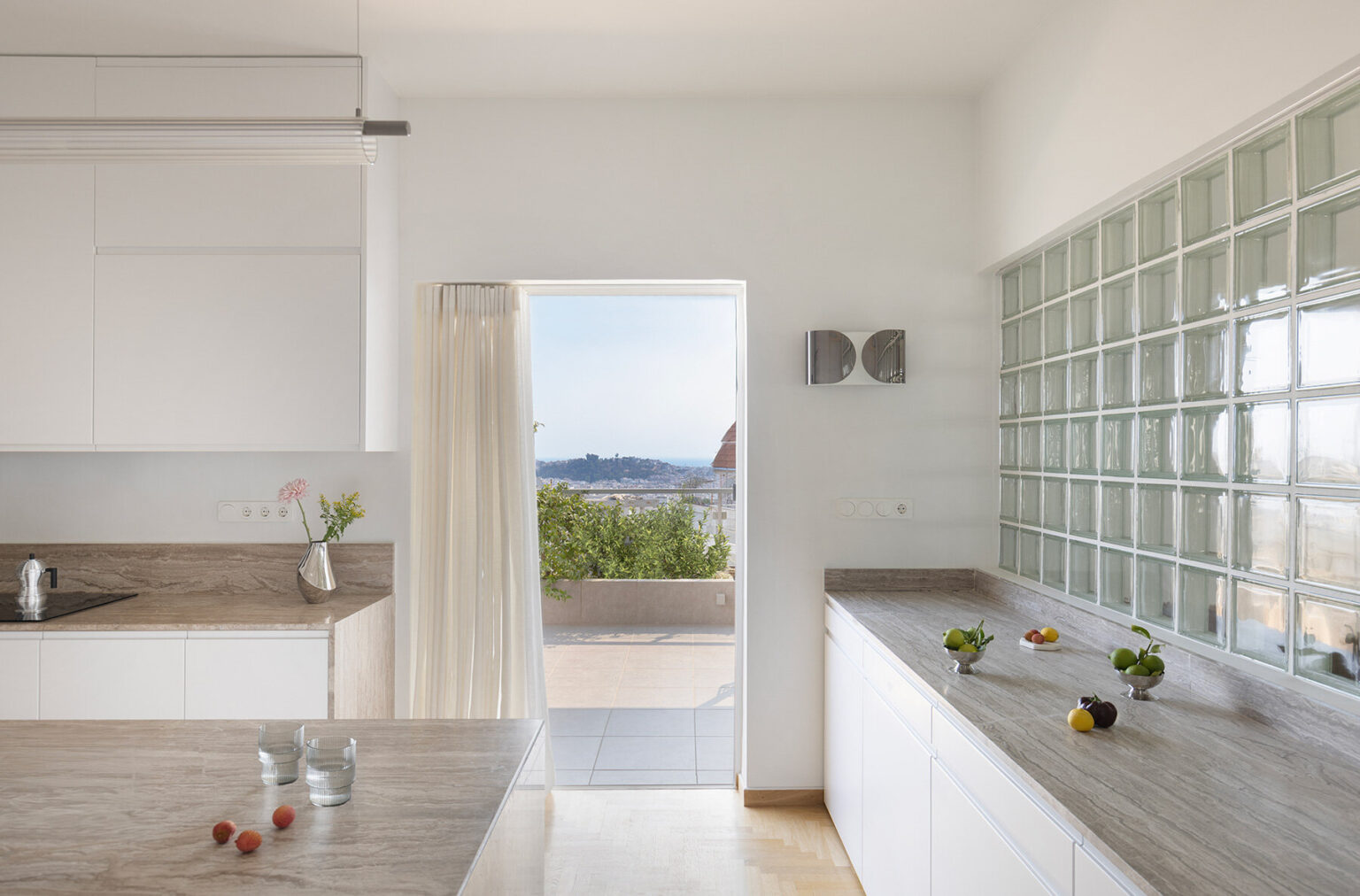 glass blocks and marble define revamp of 1960s athens penthouse