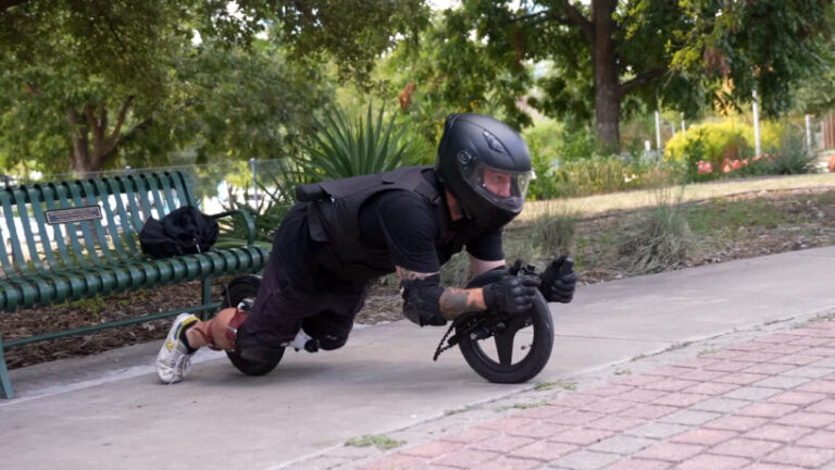 wearable electric motorcycle suit makes users ride while planking