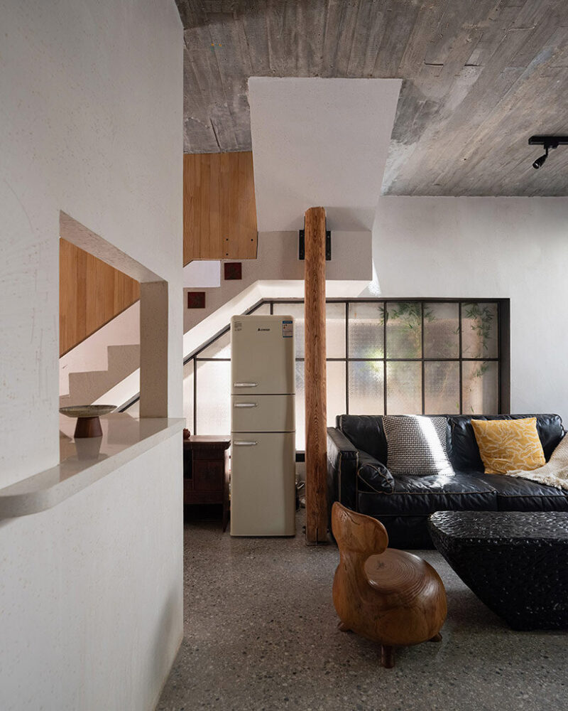 concrete arches enclose glass block interiors of renovated xuebei home