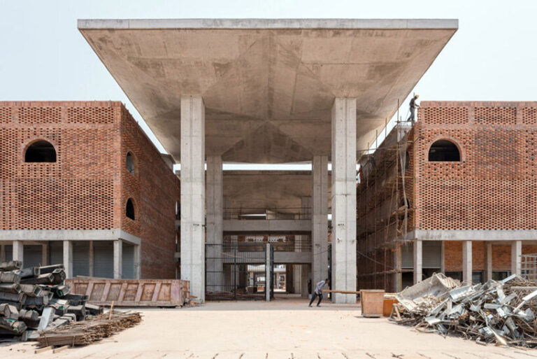 concrete canopies and brick walls form central market in congo