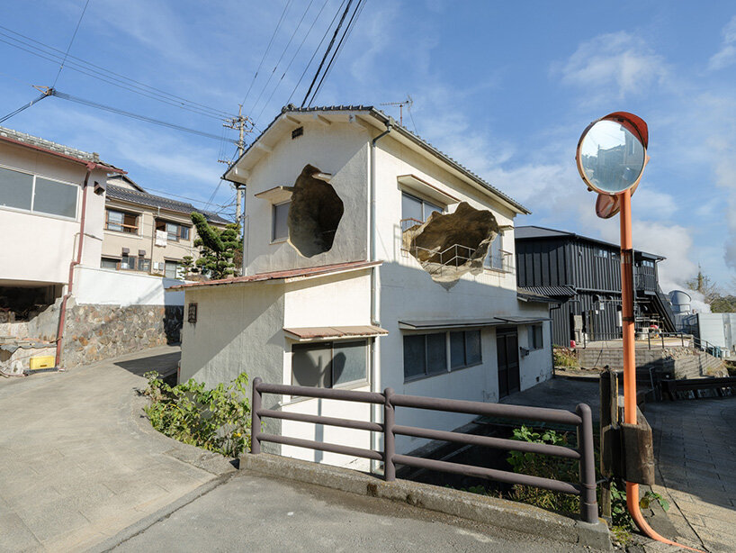 voids reveal cave-like interior inside japanese residence