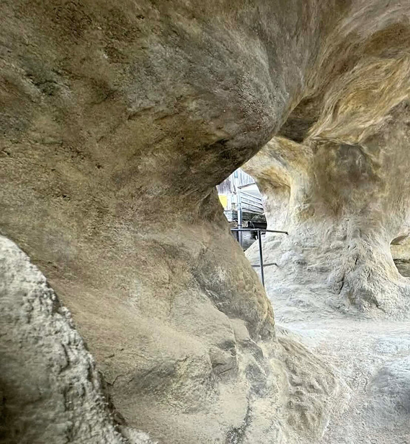 voids reveal cave-like interior inside japanese residence